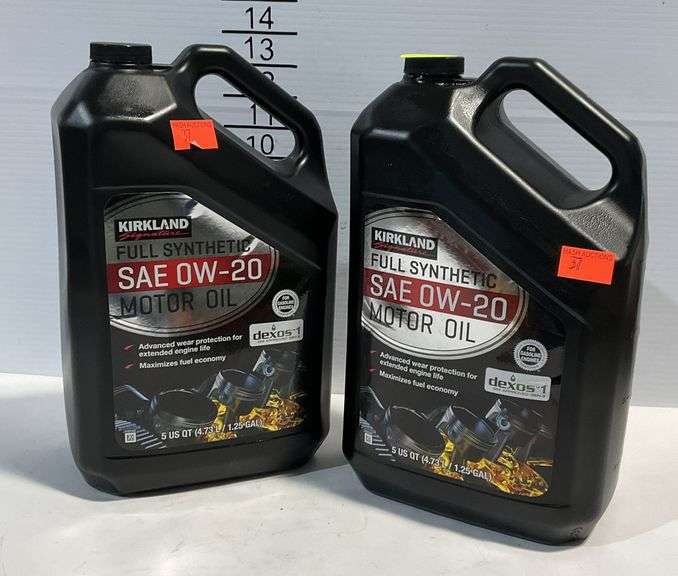 Two KIRKLAND Signature FULL SYNTHETIC SAE OW-20 MOTOR OIL, one has been ...