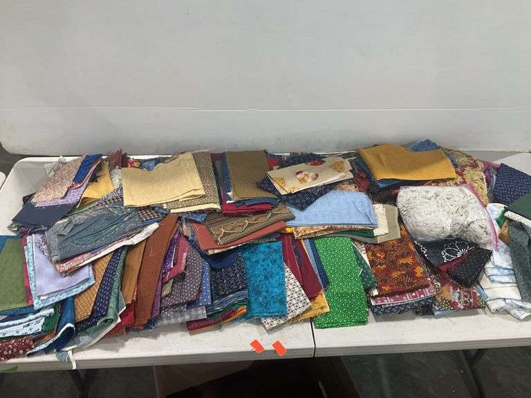 Large box of fabric pieces. - Hash Auctions