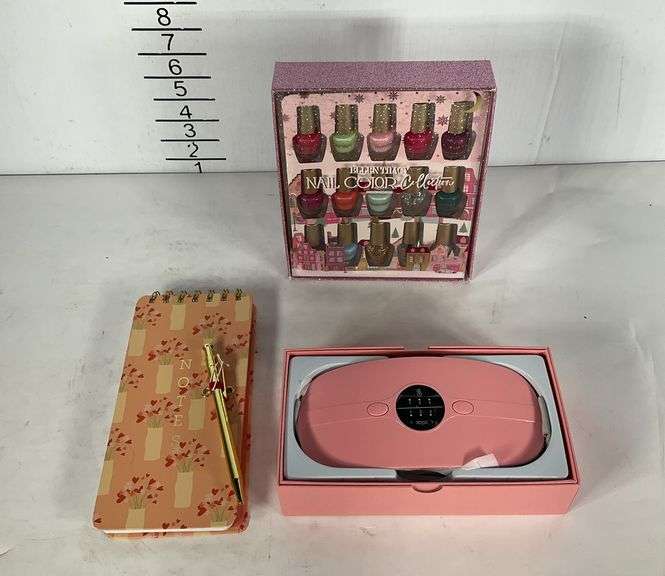 Ellen Tracy nail polish, notepad with pen, and menstrual heating pad ...