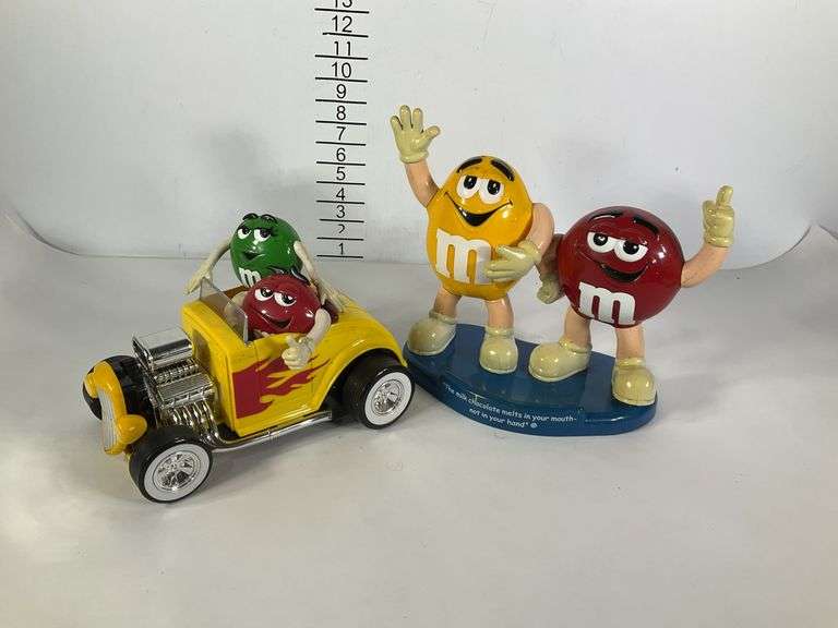 Two M & M collectible items. - Hash Auctions