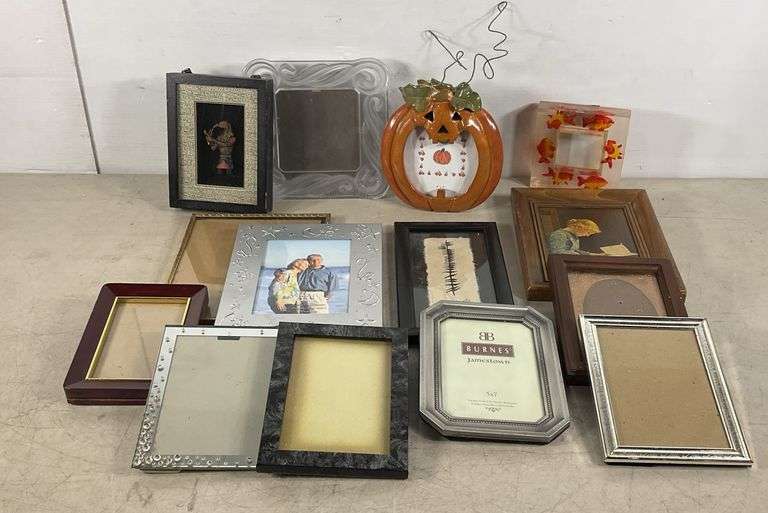 Picture frames, framed print on board, and Egyptian figure in shadow ...