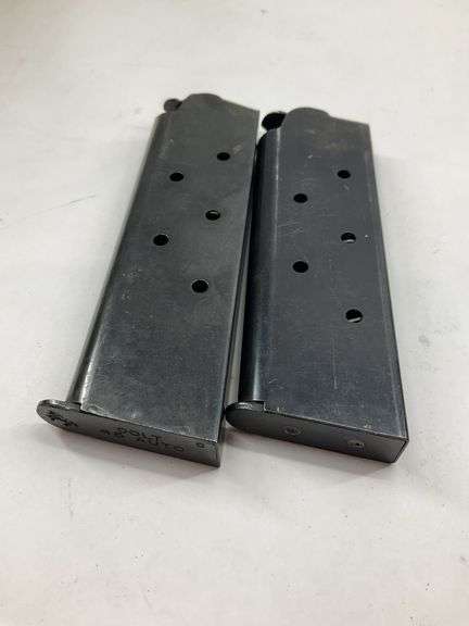 Two 45 caliber magazines - Hash Auctions