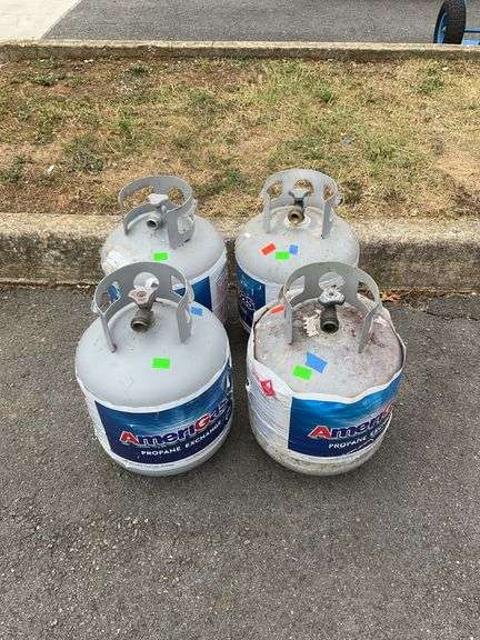 Four Propane Tanks, these tanks are mostly full going by the weight as ...