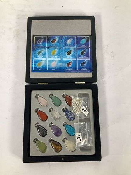 Box of gem stones with two necklaces to attach to. - Hash Auctions
