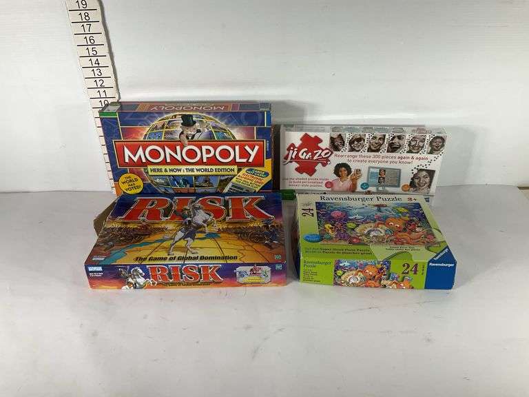 Games, credit card Monopoly, Risk, Ravensburger puzzle, and ...