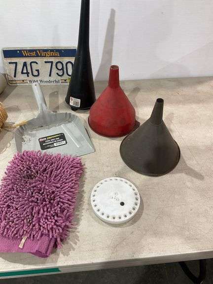 Group with sandpaper, funnels, paint brushes, plastic wrap, string ...