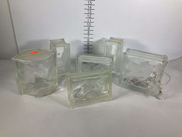 Six clear glass bricks. Various shapes and sizes. - Hash Auctions