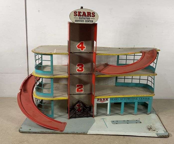 Vintage Sears metal four level service center toy. - Hash Auctions
