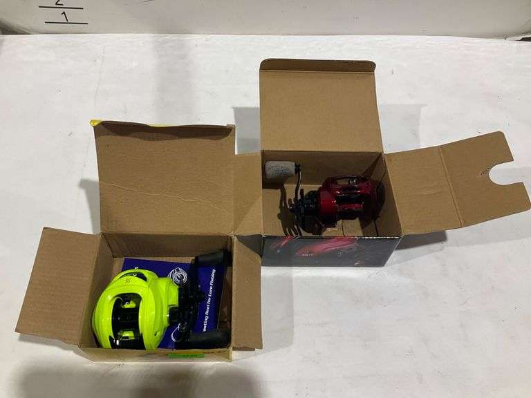 Two Fishing Reels in Original Packaging - Hash Auctions
