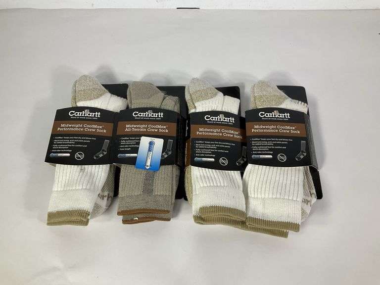 Four pair men’s Carhartt socks. - Hash Auctions