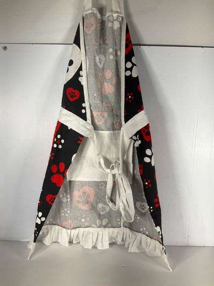 Dog-Themed Apron with Red, Black, and White Paw Print Design - Hash ...