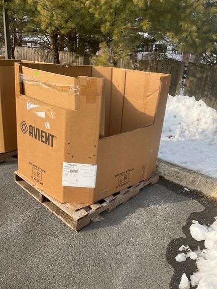 Avient Cardboard Box with Pre-Cut Side Holes on a Pallet - Hash Auctions