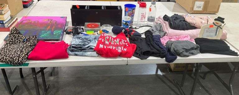 Assorted Household Items, Clothing, and Miscellaneous Goods on Display ...