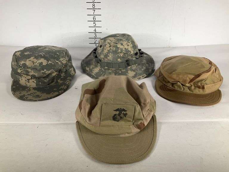 Set of Four Military Camouflage Hats in Varying Styles and Patterns ...