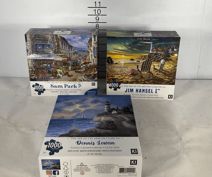 Three 1000-Piece Jigsaw Puzzles Featuring Artwork by Dennis Lewan, Sam ...