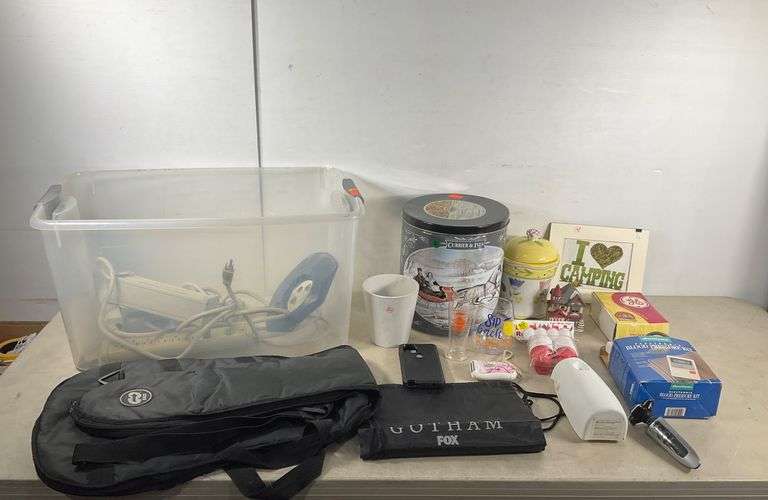 Assorted Household Items, Including Electronics, Decor, and Storage Bin ...