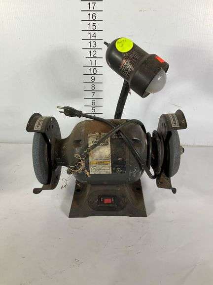 Bench Grinder with Grinding Wheels and Attached Lamp - Hash Auctions