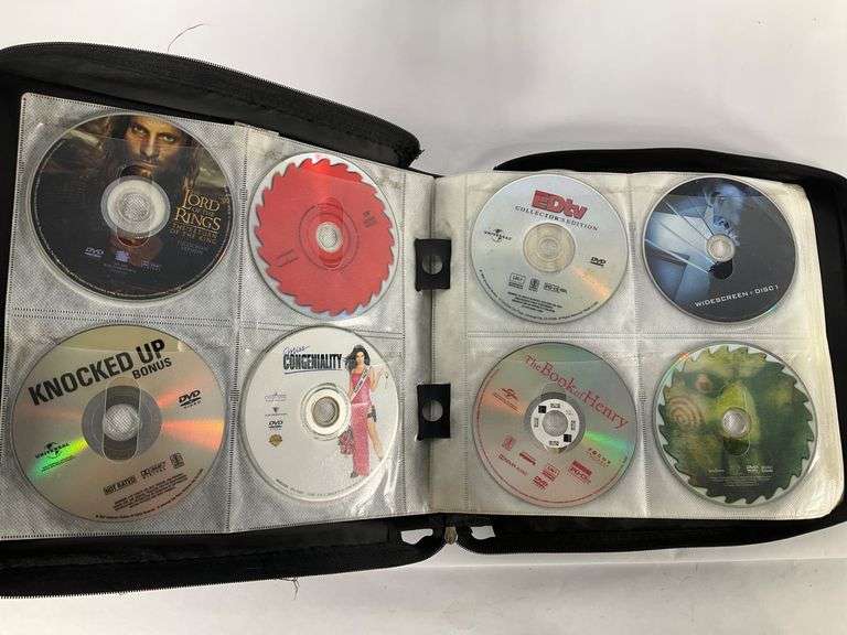 Zippered Case Containing Assorted DVDs - Hash Auctions
