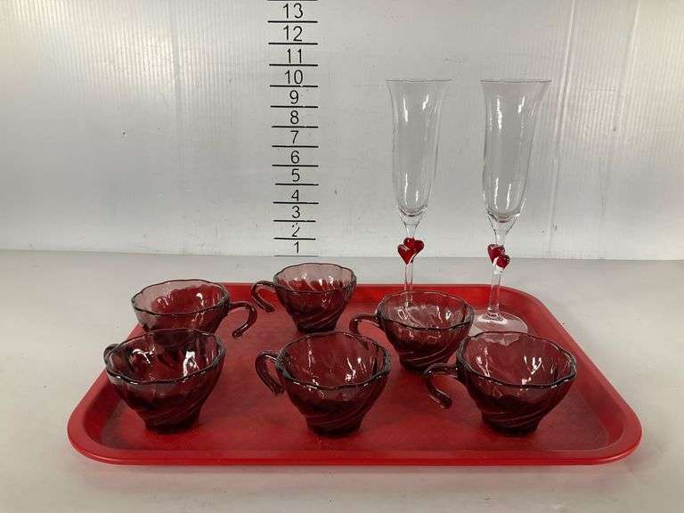 Six Red Glass Cups with Swirled Design and Two Clear Glass Champagne ...