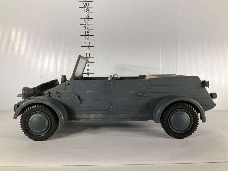 Detailed Model of Military-Style Vehicle with Markings - Hash Auctions