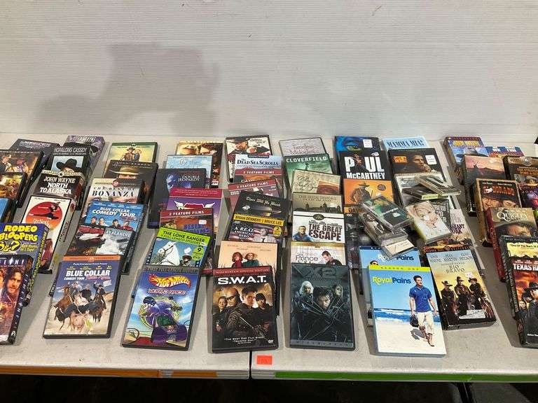 DVDs and VHS Tapes Featuring Various Genres and Titles - Hash Auctions