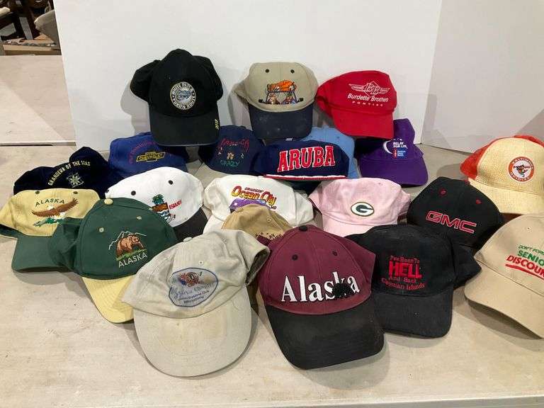 Collection ofBaseball Caps With Various Logos and Designs - Hash Auctions