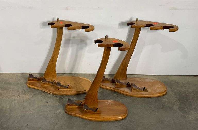Set of Three Wooden Gun Racks with Curved Base and Supports - Hash Auctions
