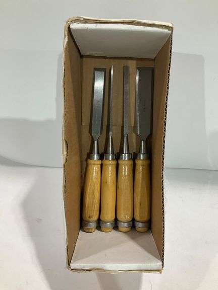 Set of Four Woodworking Chisels with Wooden Handles - Hash Auctions