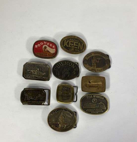Collection of Ten Brass Belt Buckles with Varied Themes - Hash Auctions