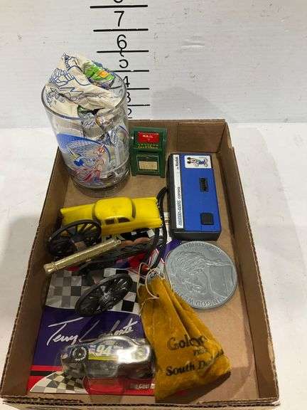 Assorted Collectible Items Including Glassware, Toy Cars, and Tokens ...