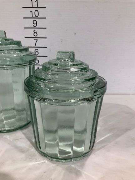 Set of Two Tiered Green Glass Storage Jars with Lids - Hash Auctions