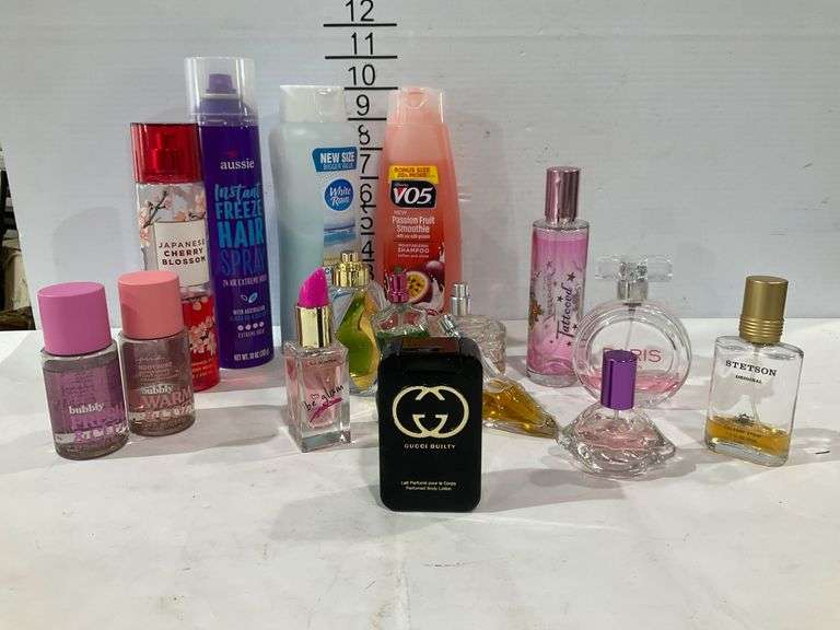 Lot of Assorted Perfume Bottles and Personal Care Items - Hash Auctions