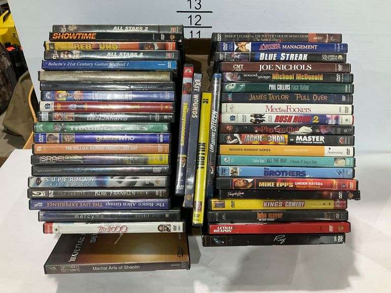 Assorted DVD Collection Featuring Movies and Concerts - Hash Auctions