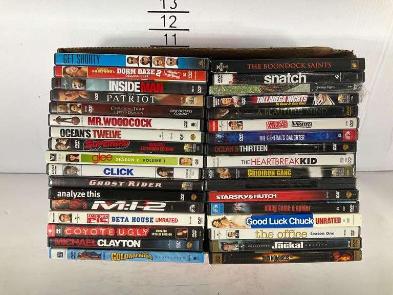 Collection of 34 DVDs Featuring Various Films and TV Shows - Hash Auctions