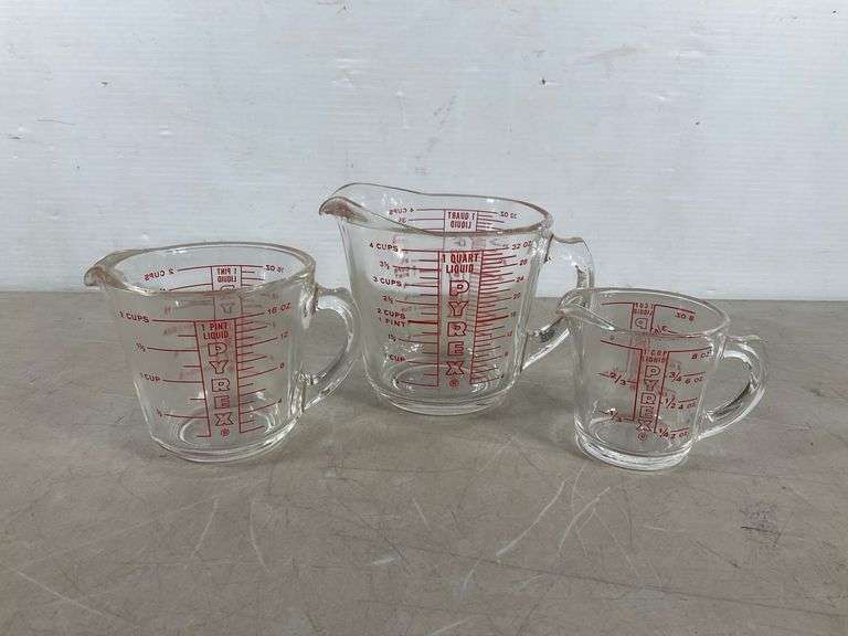 Set of Three Pyrex Glass Measuring Cups with Red Markings - Hash Auctions