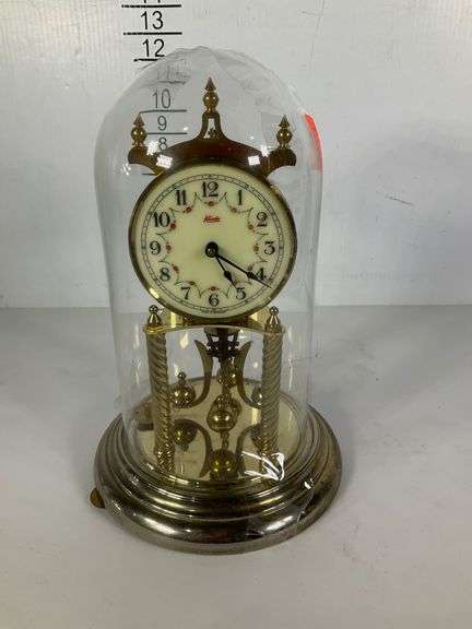 Kundo Clock with Glass Dome and Brass Base - Hash Auctions