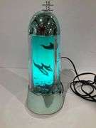 Electric Dolphin-Themed Motion Lamp with Cylindrical Base - Hash Auctions