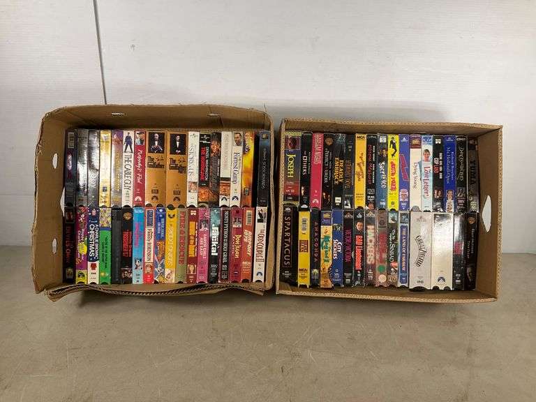 Two boxes: Lot of Assorted VHS Tapes Featuring Various Movie Titles ...
