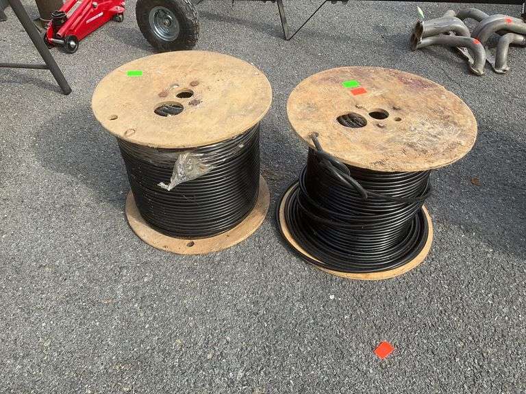Two Spools of Black Insulated Cable - Hash Auctions