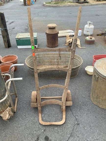 Vintage Metal Hand Truck with Dual Wheels and Curved Support From the ...
