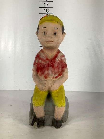 Painted Figurine of a Boy Seated on a Rock - Hash Auctions