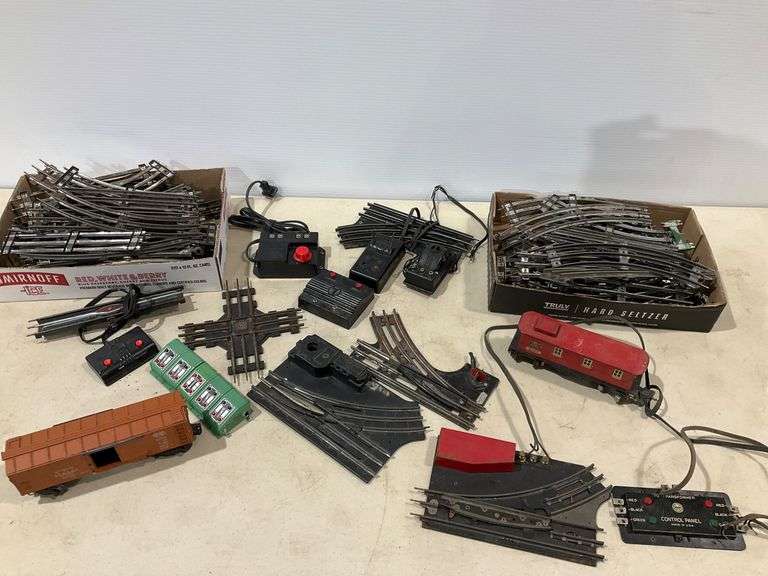 Collection of Model Train Tracks, Controllers, and Rolling Stock - Hash ...