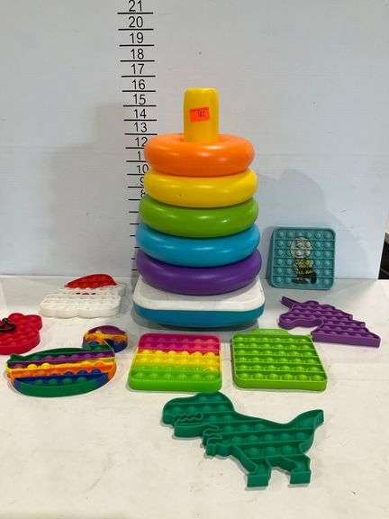 Assorted Plastic Stacking Toy and Pop-It Fidget Toys - Hash Auctions