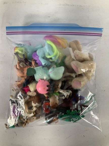 Bag of Assorted Toy Figures and Accessories - Hash Auctions