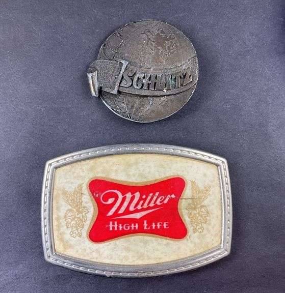 Two advertising belt buckles, Miller High life and Schlitz - Hash Auctions