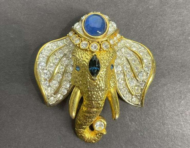 Goldtone elephant brooch - Hash Auctions