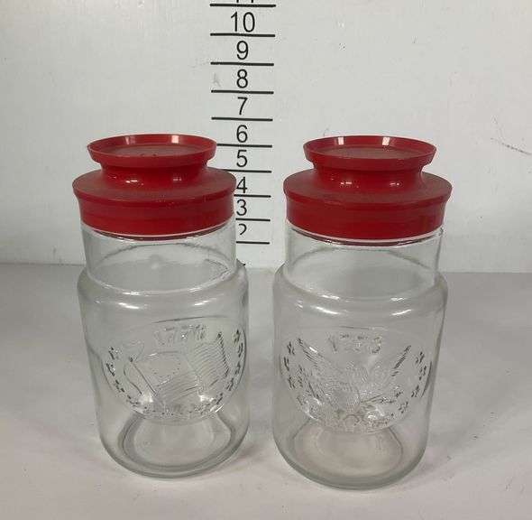 Pair of Clear Glass Jars with Embossed Eagle and Red Plastic Lids ...