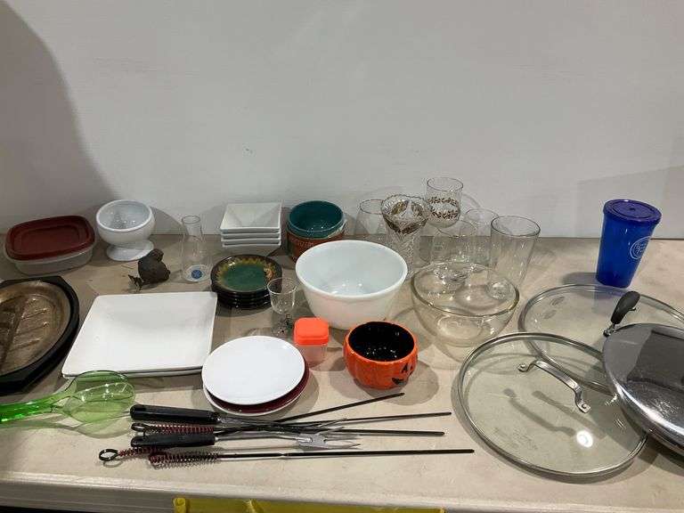 Assorted Kitchenware Including Bowls, Glassware, and Cooking Utensils ...