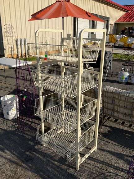 Cream Metal Multi-Tier Shelving Unit with Integrated Wire Baskets ...