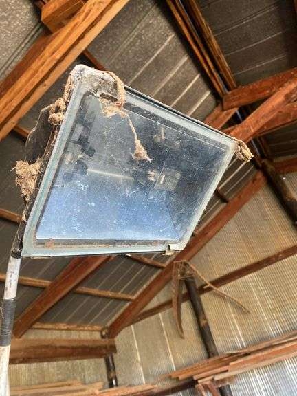 Shop light mounted to weighted tire base. One of a kind farmer light ...